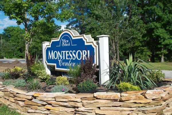 school sign - New School Montessori Center